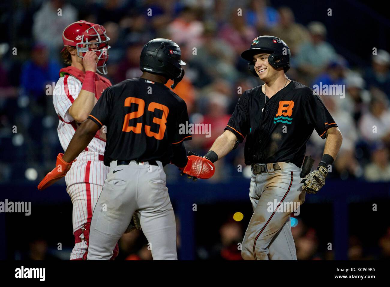Chesapeake Baysox Austin Overn (7) celebrates with Enrique Bradfield Jr ...