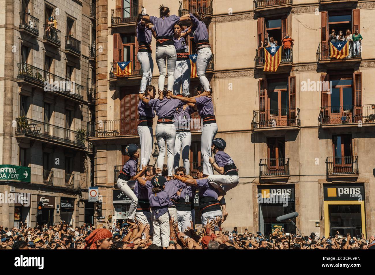 Barcelona, Spain. 24 September, 2025: 'Castellers' build one of their ...