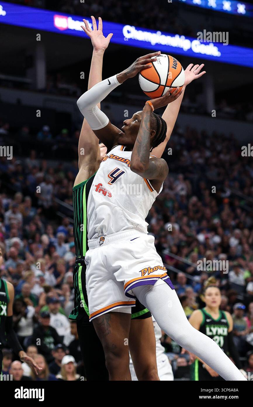 Phoenix Mercury forward Natasha Mack (4) shoots against Minnesota Lynx ...