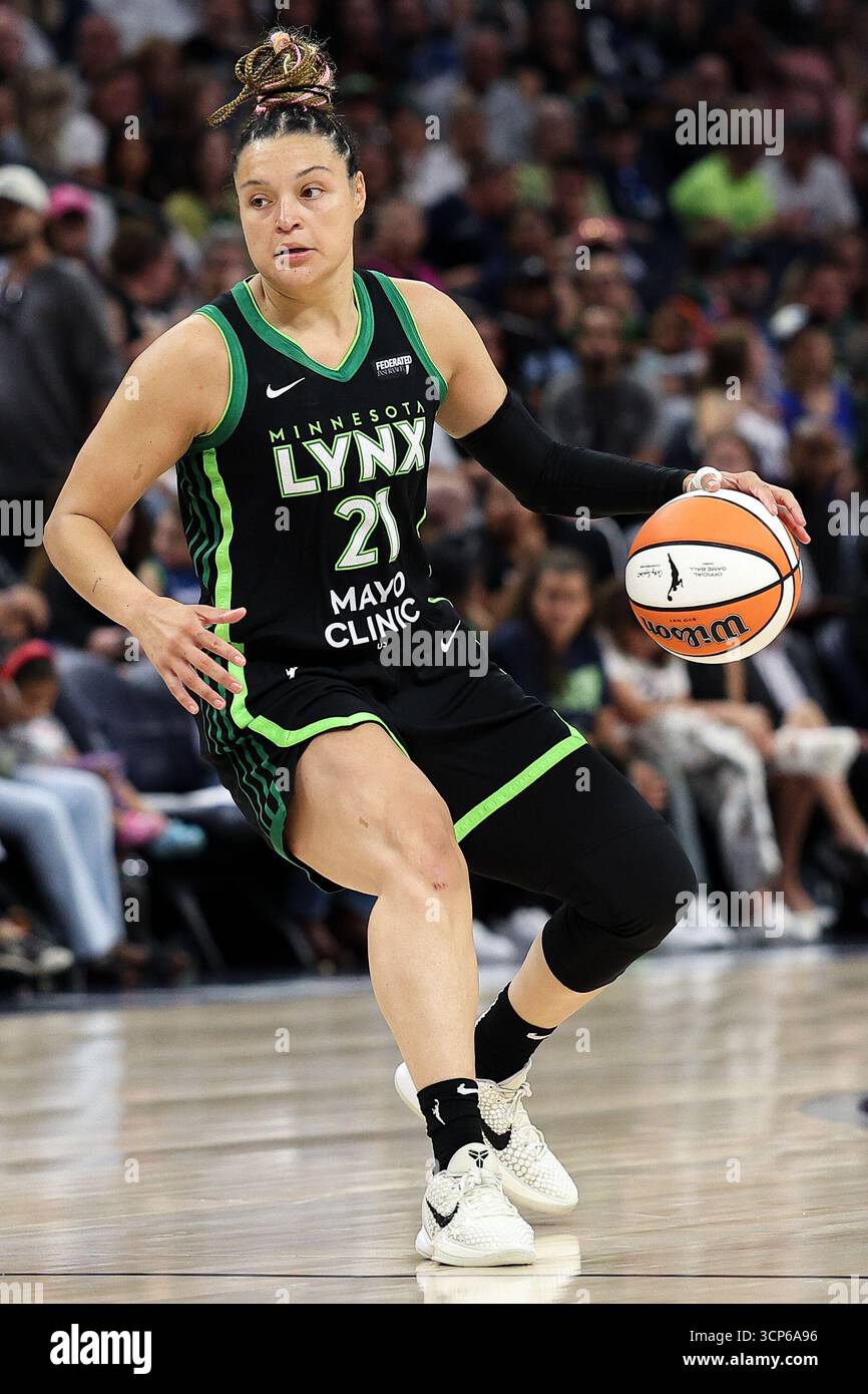 Minnesota Lynx guard Kayla McBride (21) dribbles the ball up court ...