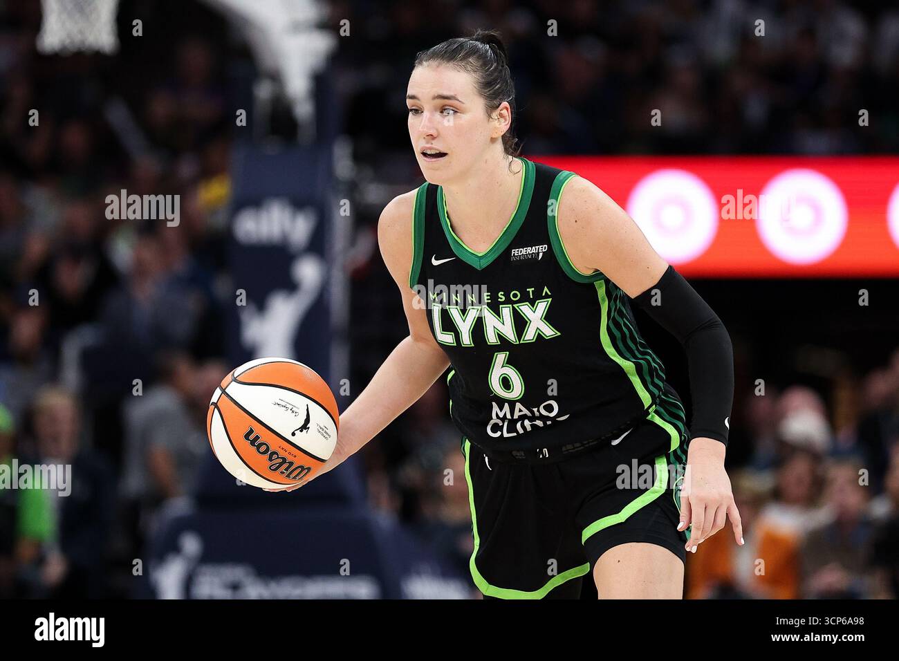 Minnesota Lynx forward Bridget Carleton (6) dribbles the ball up court ...