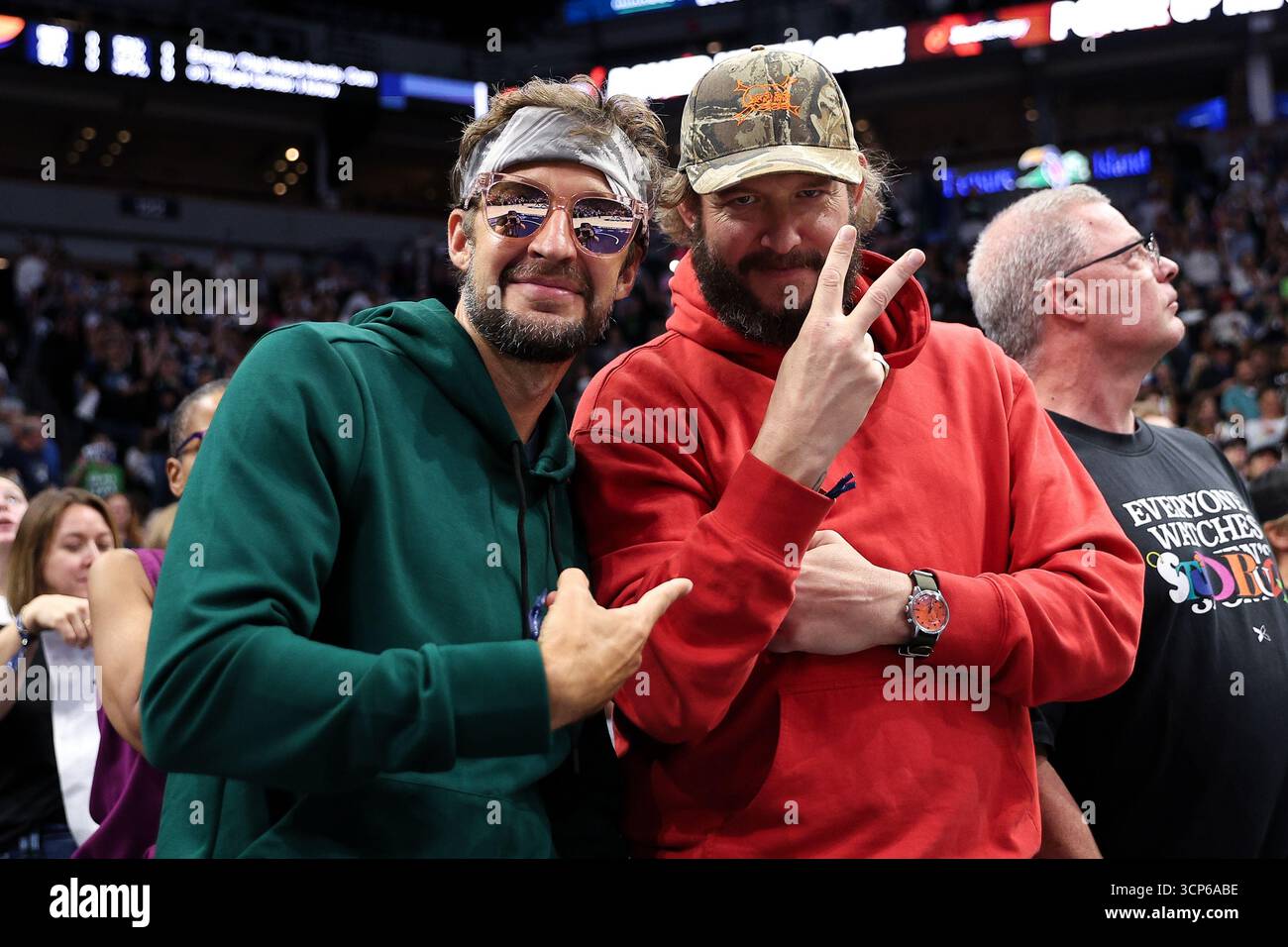 Justin Vernon, right, lead singer of Bon Iver poses for a photo during ...