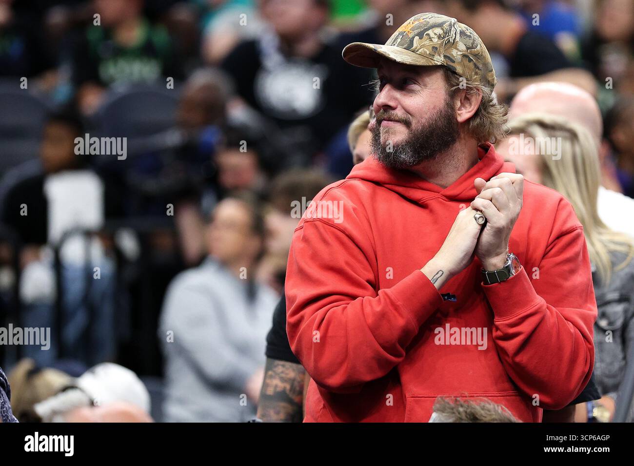Justin Vernon, lead singer of Bon Iver reacts during the second half of ...