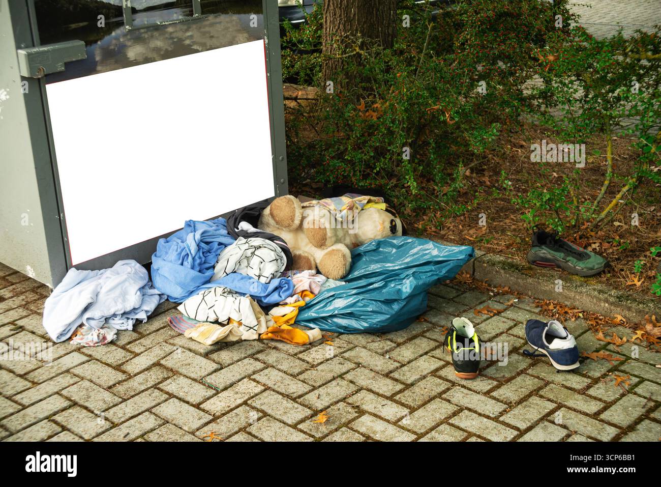 Urban street scene symbolizing poverty, social issues, and humanity ...