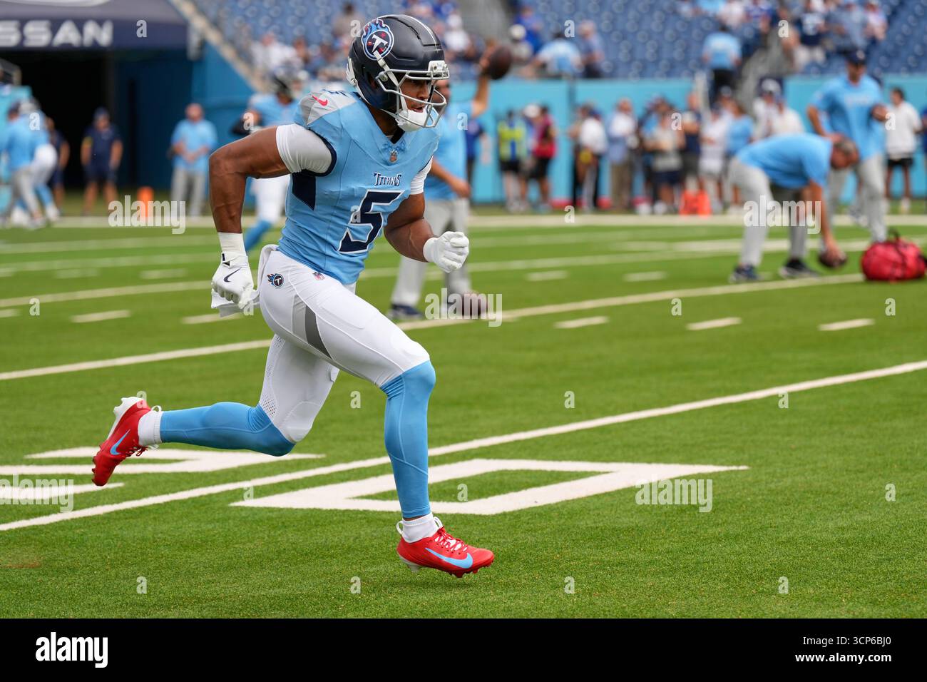 Tennessee Titans wide receiver Elic Ayomanor (5) warms up before an NFL ...