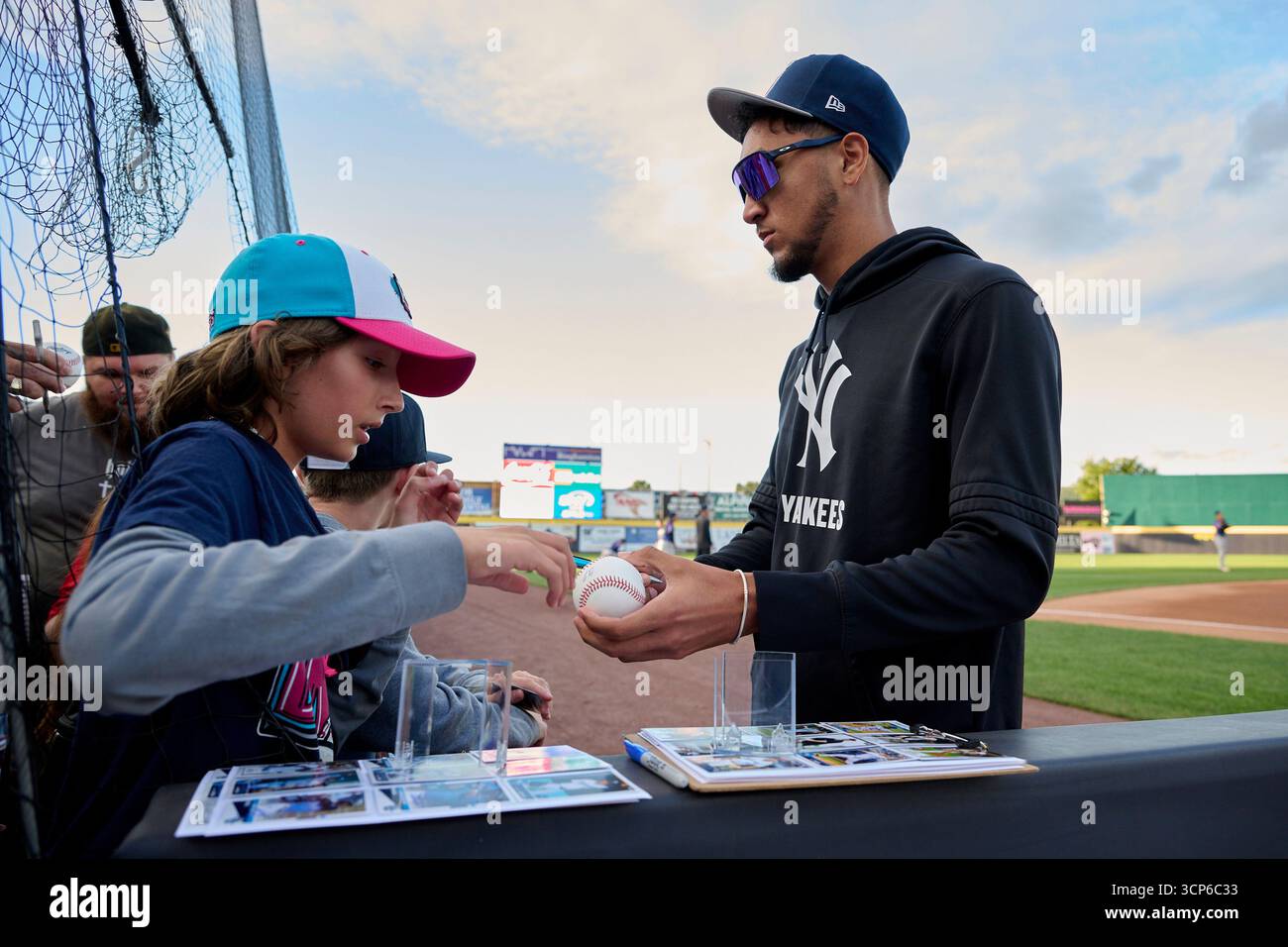 Somerset Patriots pitcher Elmer Rodriguez-Cruz signs autographs before ...