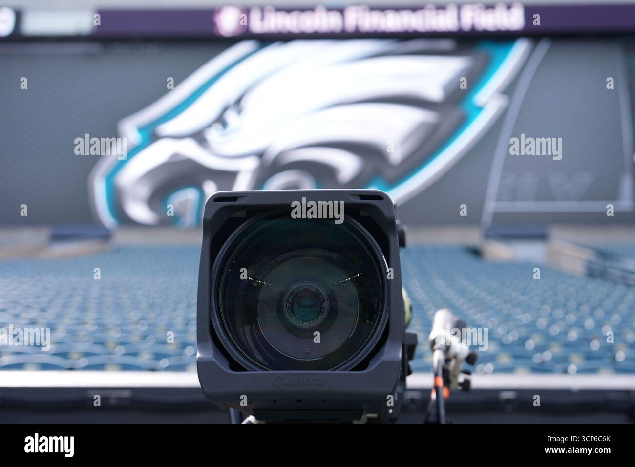 A television camera is seen before an NFL football game between the ...