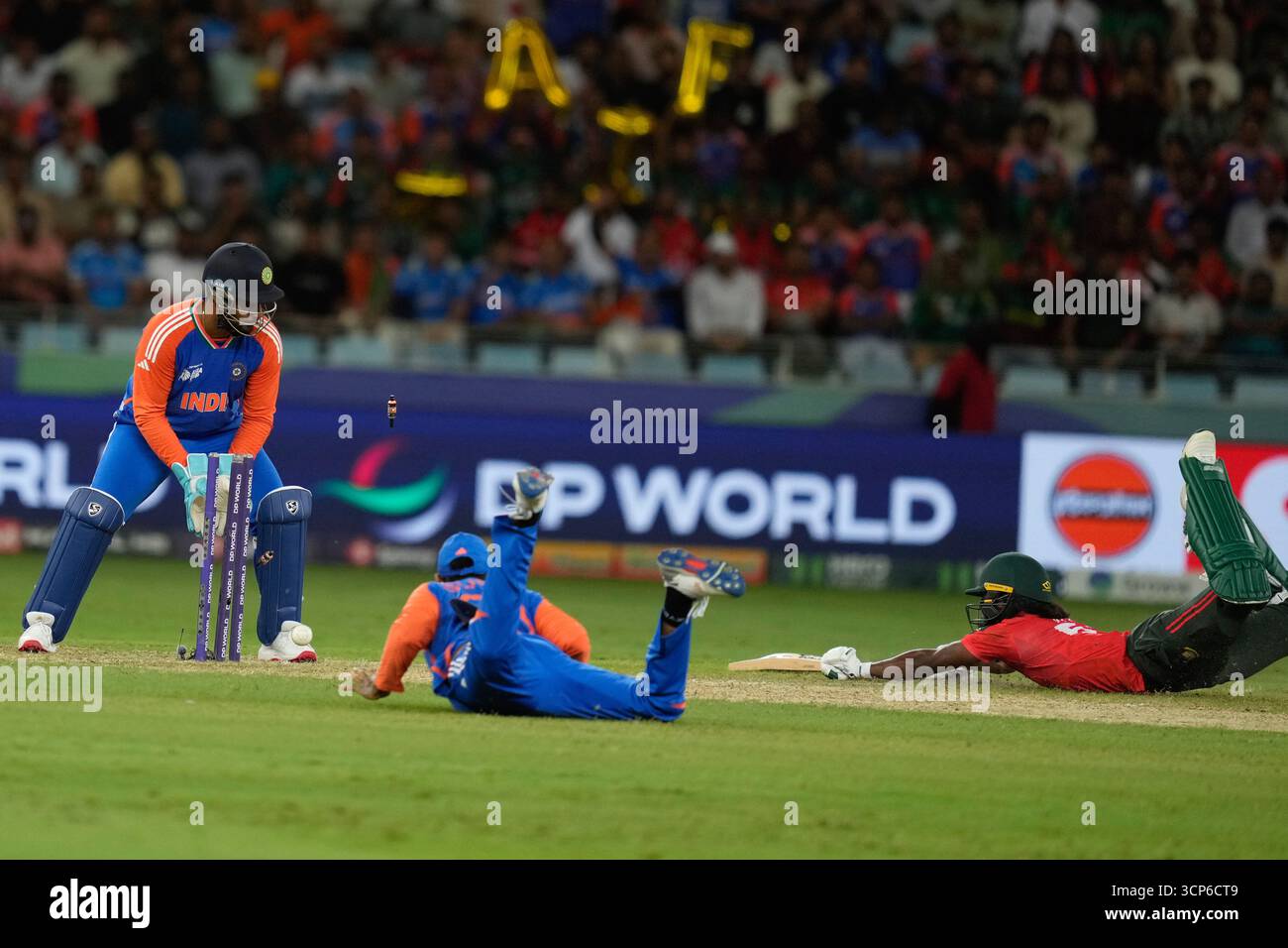 India's captain Suryakumar Yadav, second from left, successfully run ...