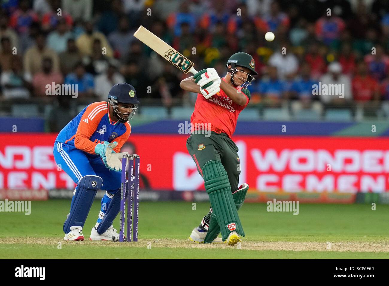 Bangladesh's Mohammad Saifuddin plays a shot during the Asia Cup ...