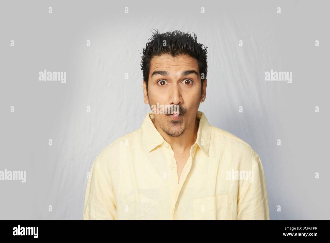 Surprised indian man in hi-res stock photography and images - Alamy