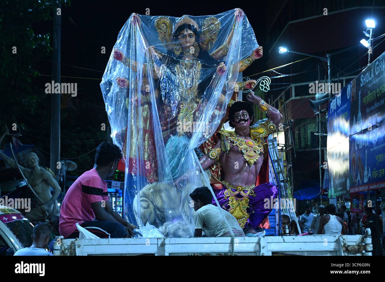 KOLKATA, INDIA - SEPTEMBER 24: Idols of Goddess Durga are covered with ...