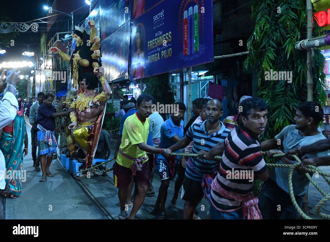 KOLKATA, INDIA - SEPTEMBER 24: Idols of Goddess Durga are transported ...