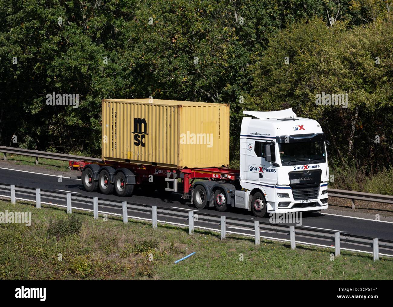 Port Express lorry carrying a MSC shipping container on a slip road of ...