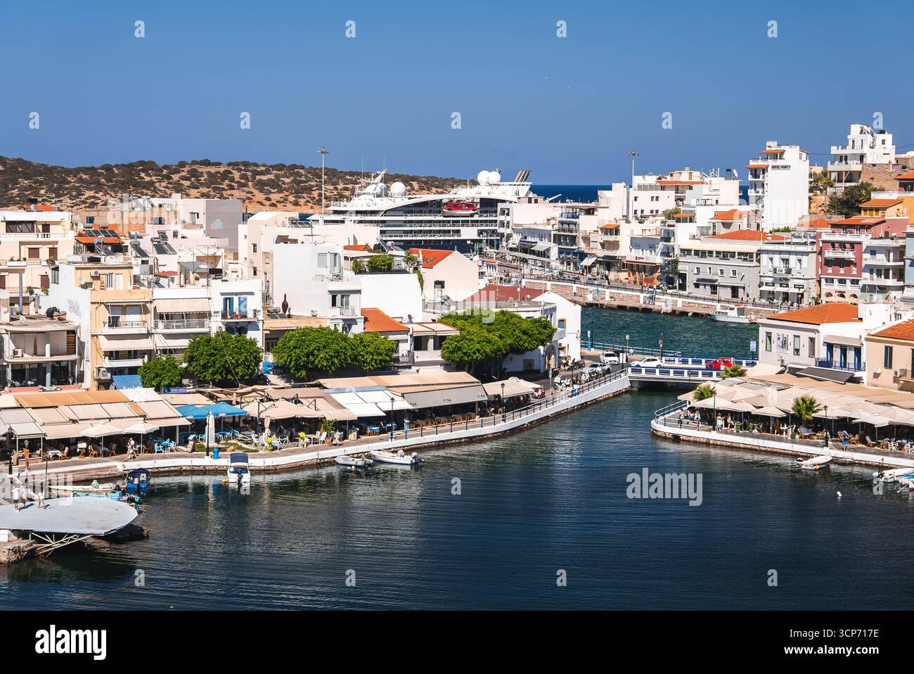 Coastal Town with Canal and Cruise Ship on Crete Island, Greece Stock ...