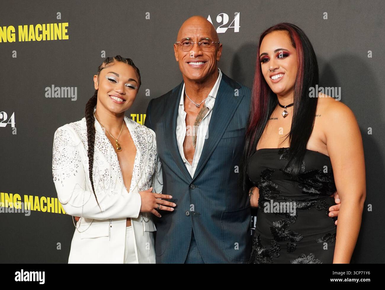 (left to right) Tatyanna Dumas, Dwayne Johnson and Simone Johnson attend a special screening of ...