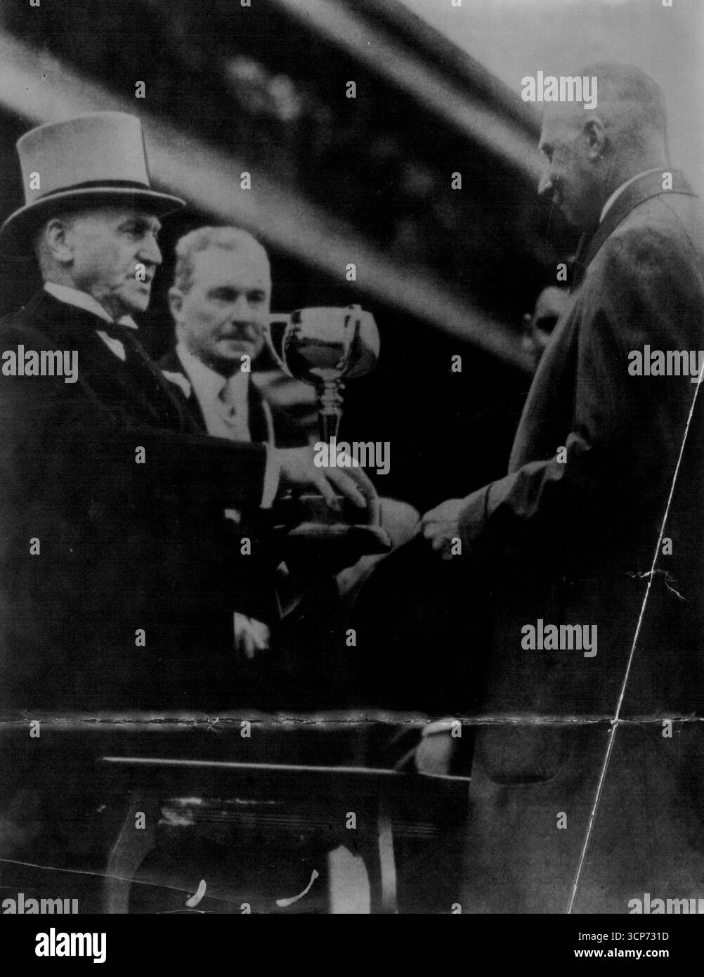 The Governor-General, Sir Isaac Isaacs, presenting the Cup to Mr. R.R ...