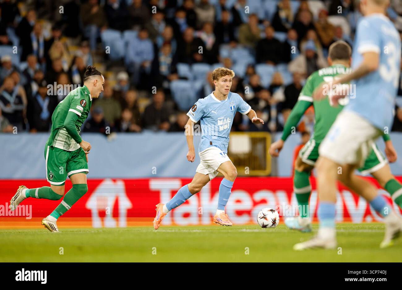 Ludogorets Son, left, and Malmo's Hugo Bolin during the Europa League ...