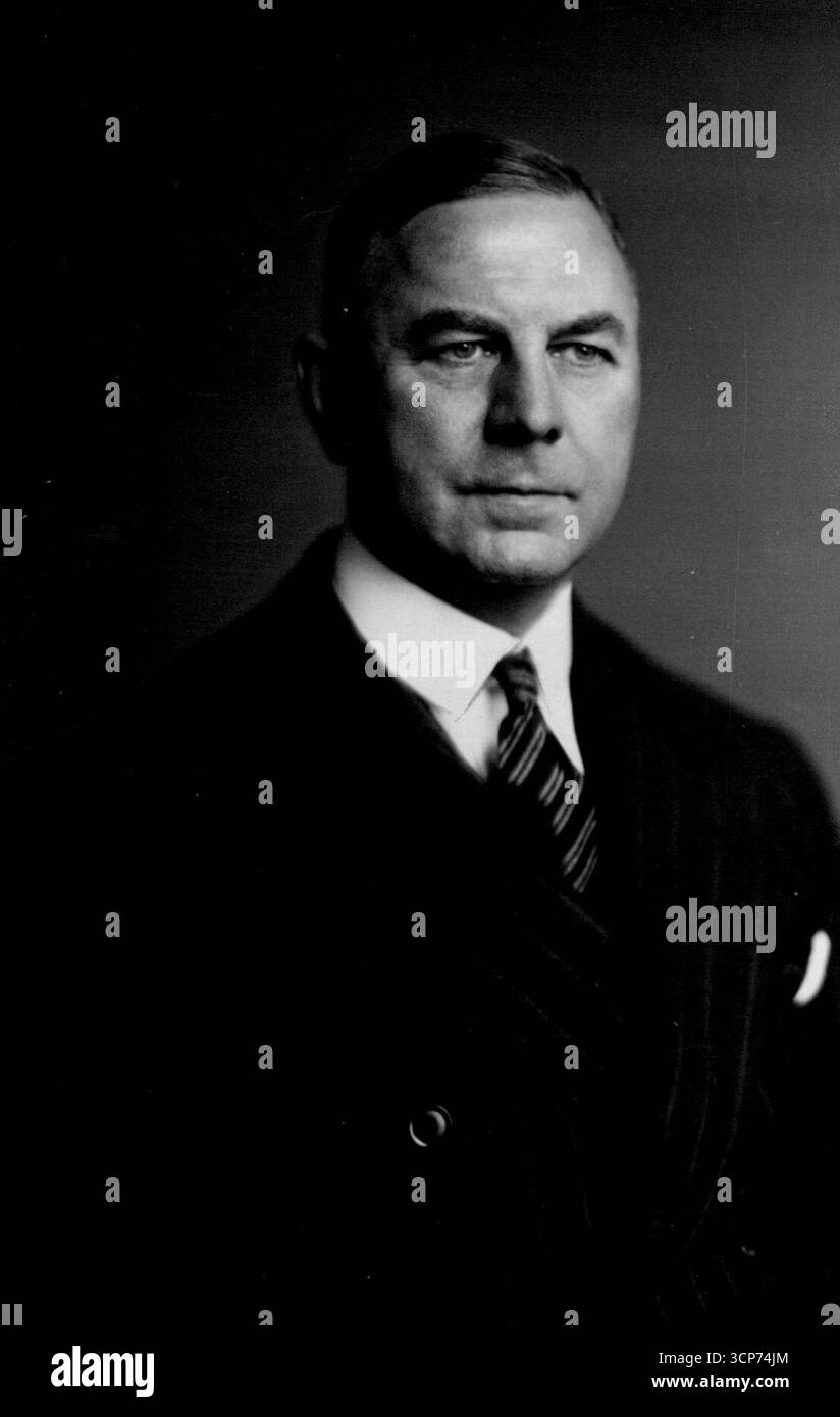 A recent portrait of Sir Graham Cunningham, KBE, one of the members of ...