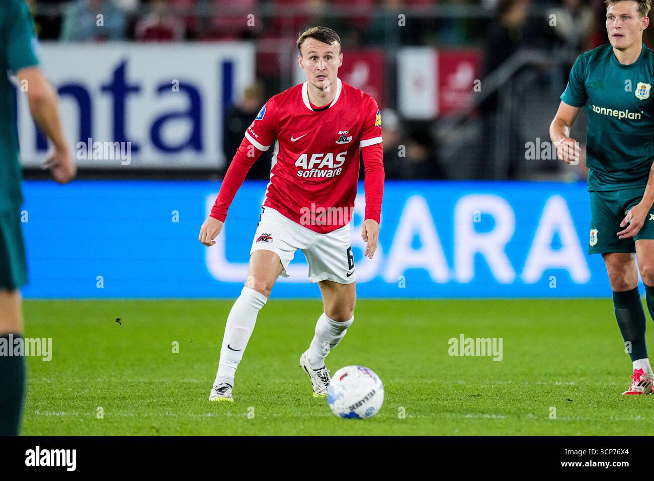 ALKMAAR, NETHERLANDS - SEPTEMBER 24: Peer Koopmeiners of AZ Alkmaar ...