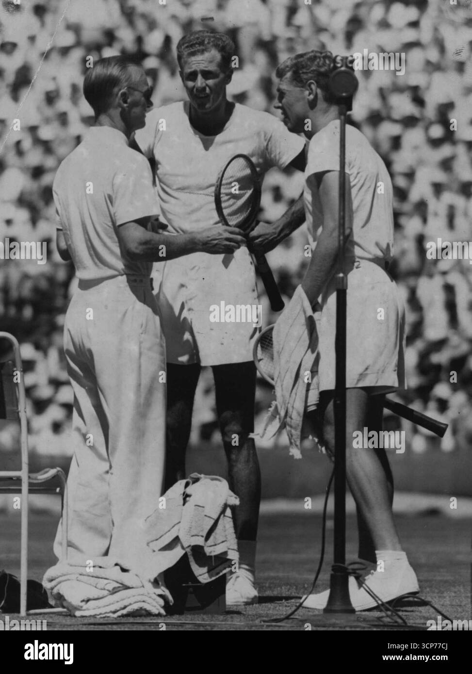 Australia's new-playing captain, Harry Hopman (left) talks with his ...