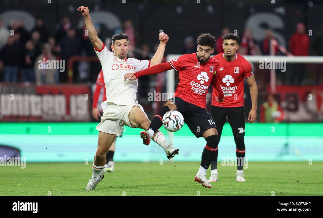 Kortrijk's Lennard Hens and Rwdm's Ilyes Ziani fight for the ball ...