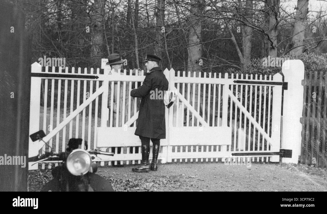 O.P.S. A Police dispatch rider handing papers to a plain clothes man ...