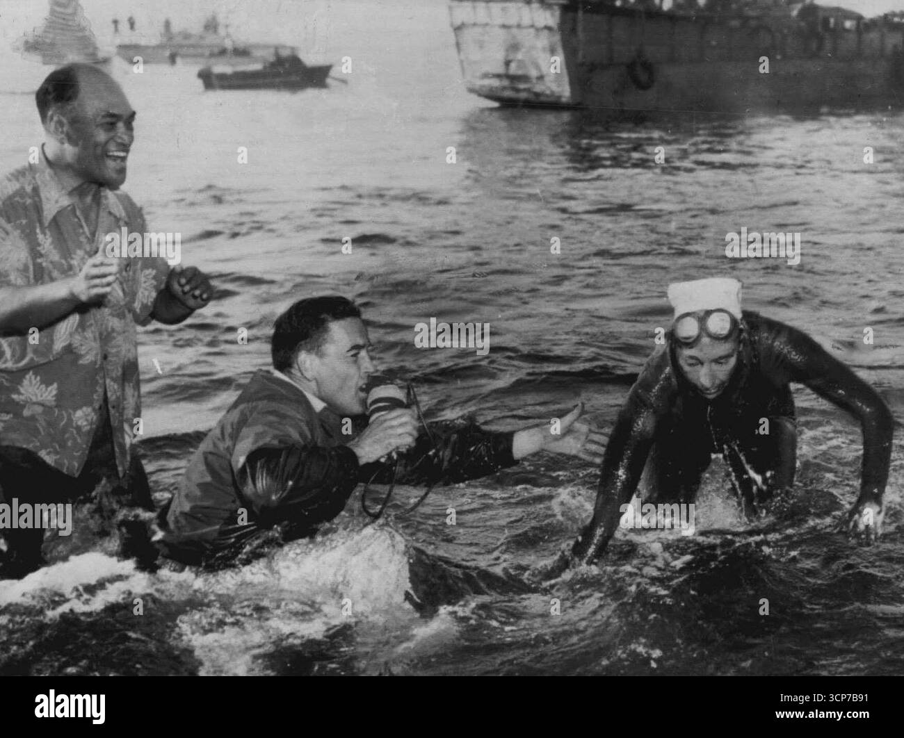 People beside water Black and White Stock Photos & Images - Alamy