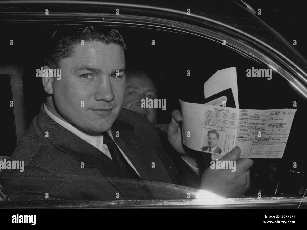 Don Cockell Prepares to leave for America.OPS: Don Cockell displays his ...