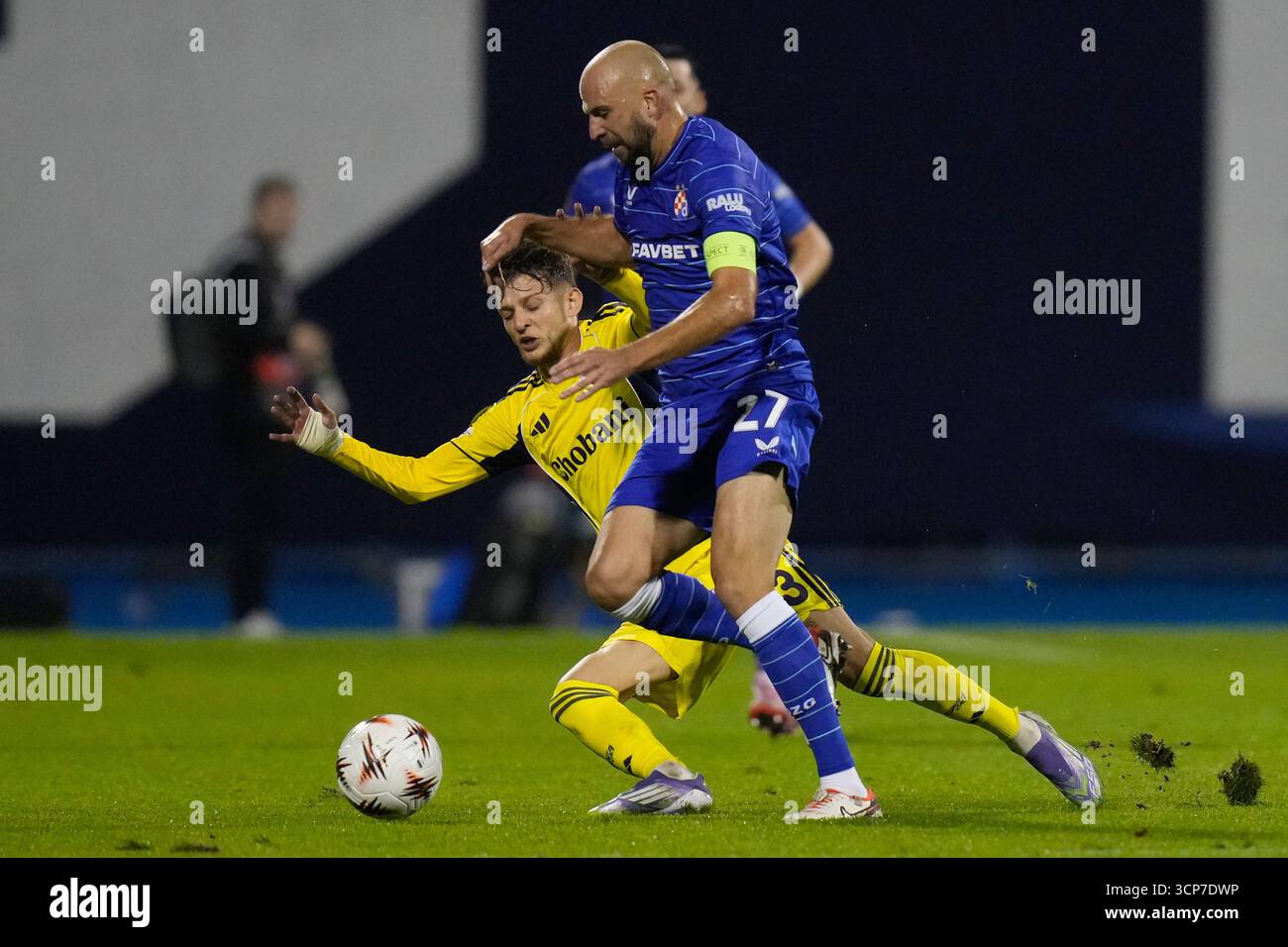 Dinamo's Josip Misic, foreground, and Fenerbahce's Archie Brown ...