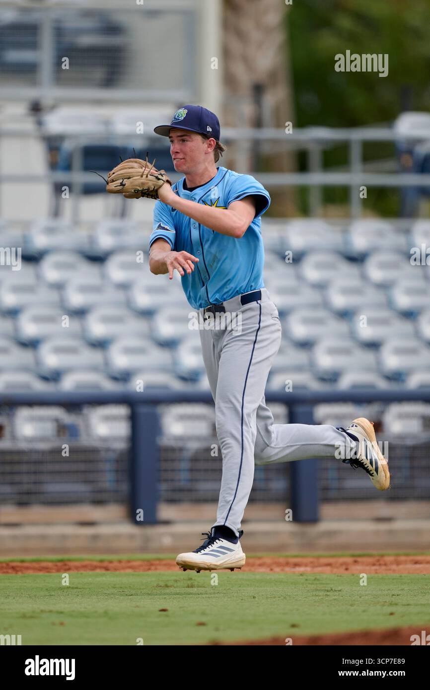 Tampa Bay Rays third baseman Cooper Flemming (11) throws home for an ...