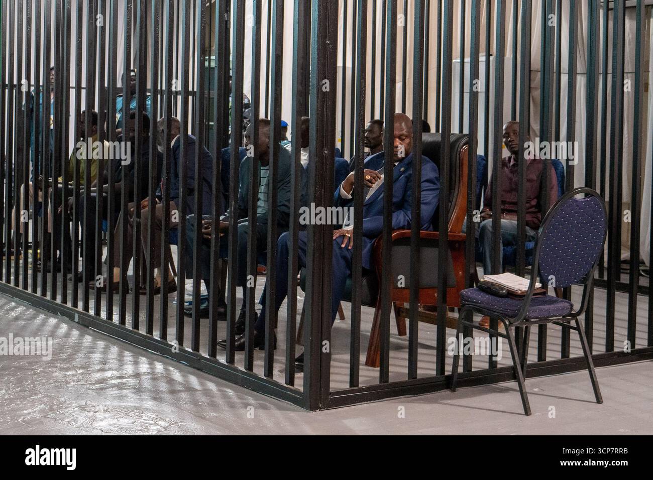 South Sudan's suspended First Vice President Riek Machar, seated at far ...
