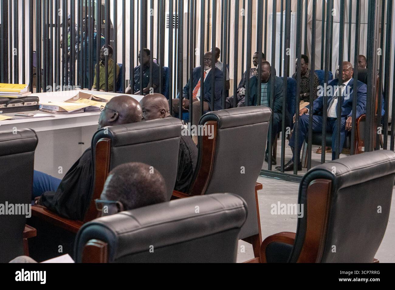South Sudan's suspended First Vice President Riek Machar, seated at far ...