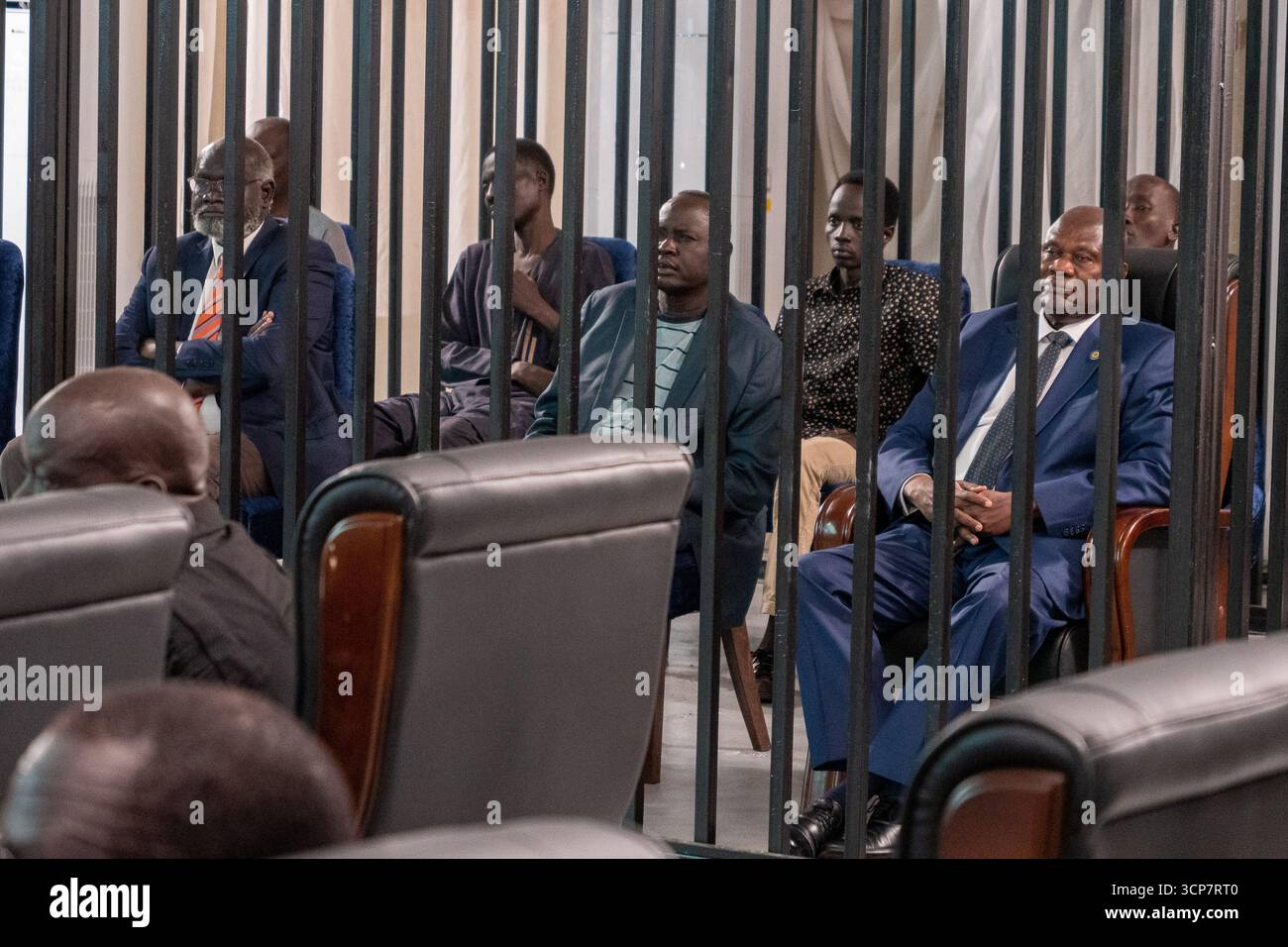 South Sudan's suspended First Vice President Riek Machar, seated at far ...