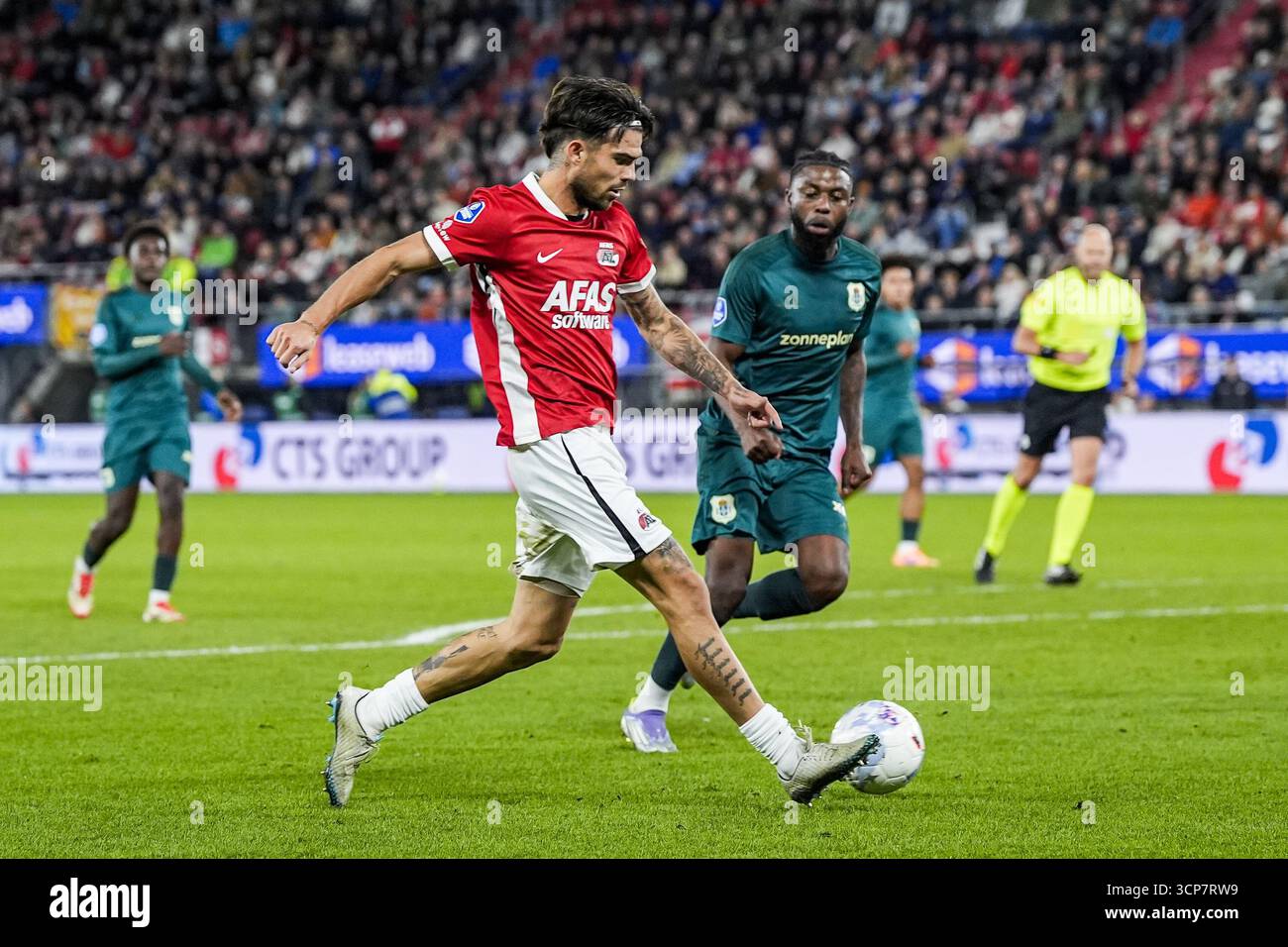ALKMAAR - (l-r) Denso Kasius of AZ Alkmaar, Sherel Floranus of PEC ...