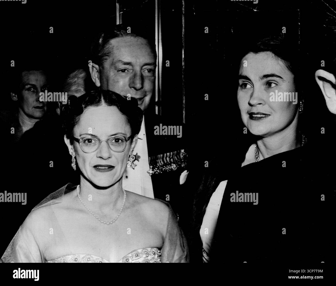 Regular first-nighters Sir John Collins and Petite Lady Collins, and ...