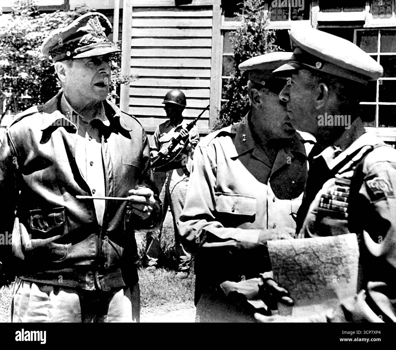 MacArthur Chats With Generals - Holding the corn cob pipe he carried ...