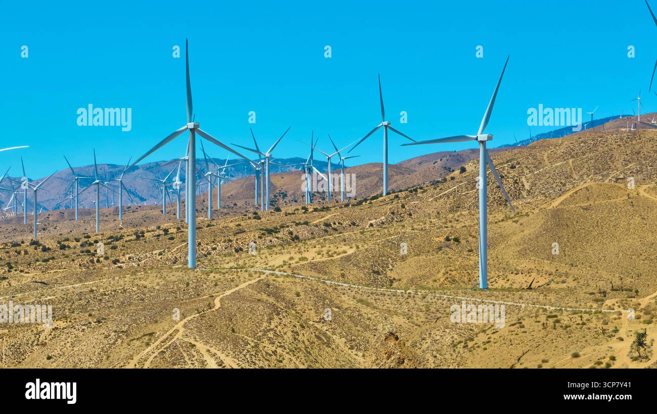 Aerial Wind Turbines in Mojave Desert California with Blue Sky and ...