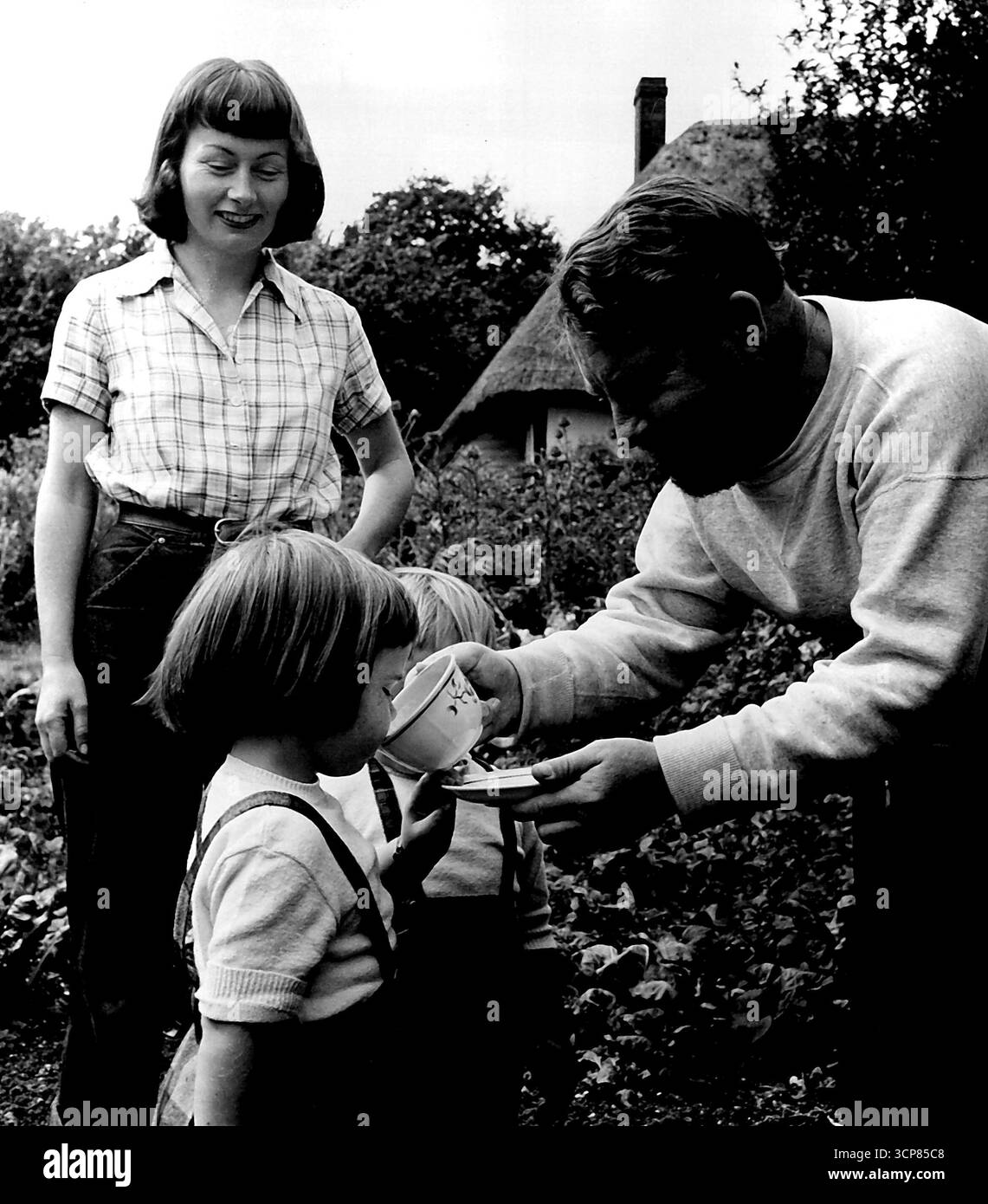 Katherine, gets a sip of her father's tea in the Potato patel. June 08 ...