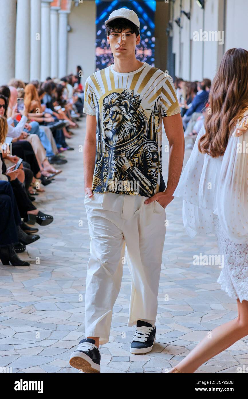 A model is seen on the catwalk at the Custo Barcelona Milano fashion ...