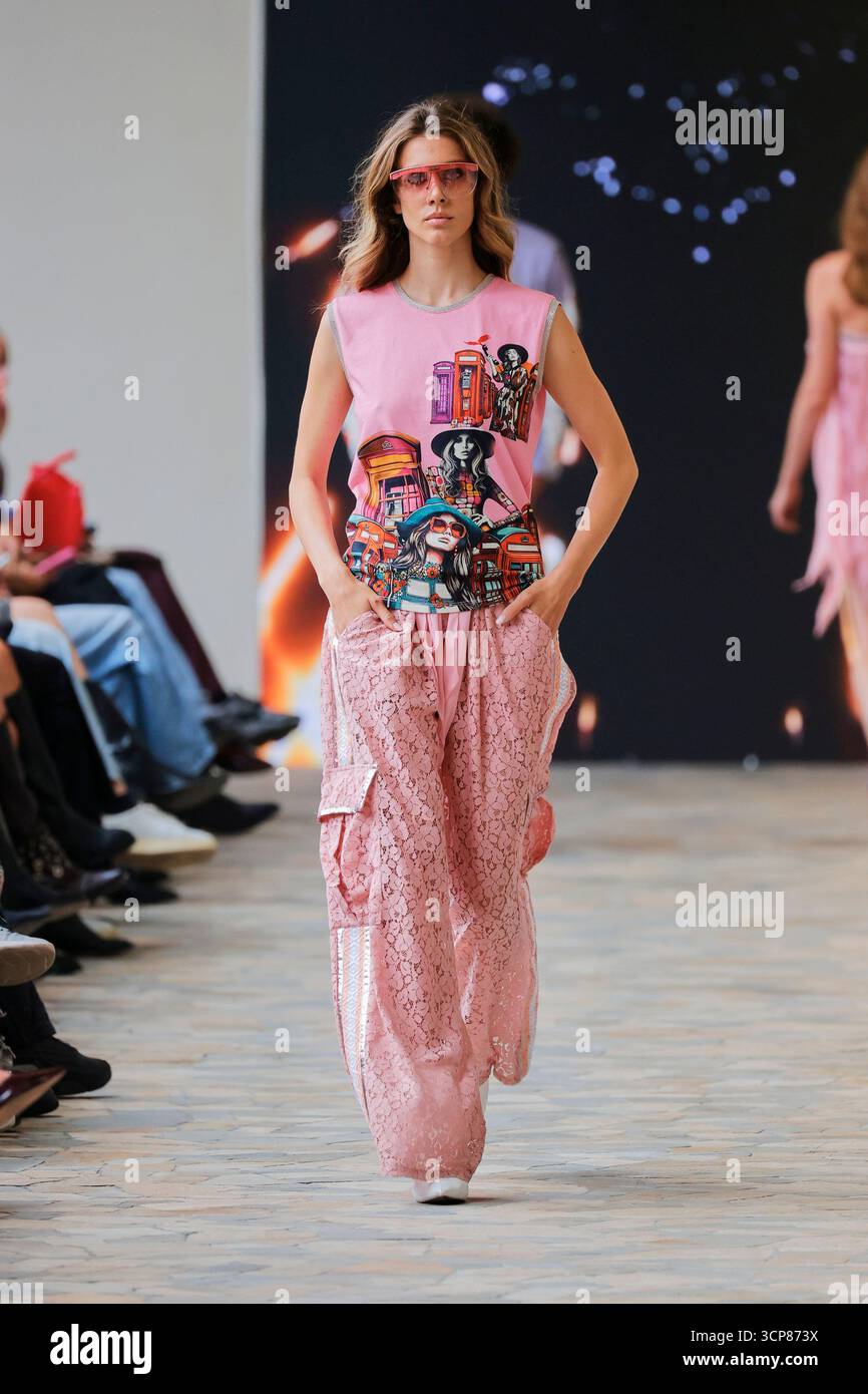 A model is seen on the catwalk at the Custo Barcelona Milano fashion ...