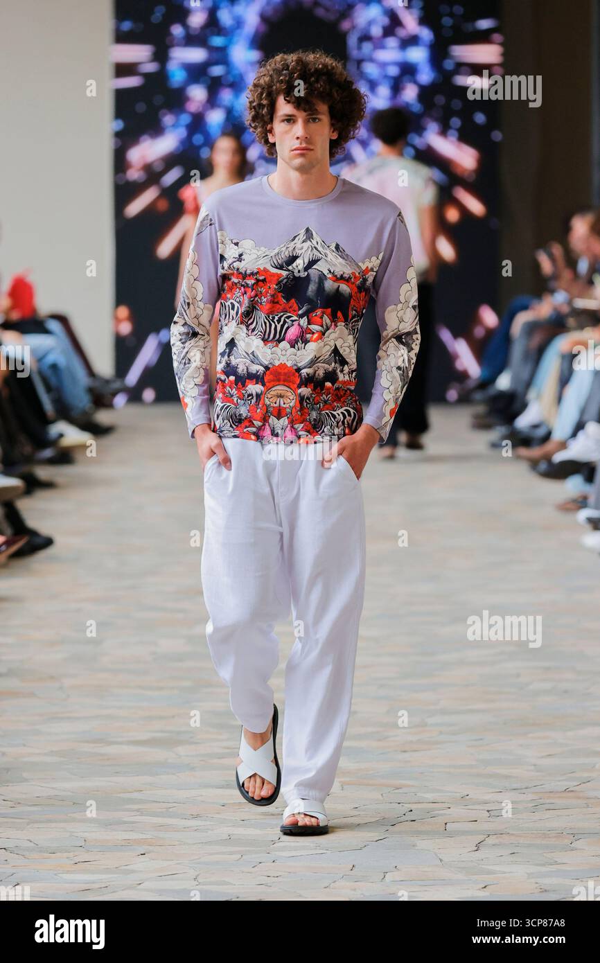 A model is seen on the catwalk at the Custo Barcelona Milano fashion ...