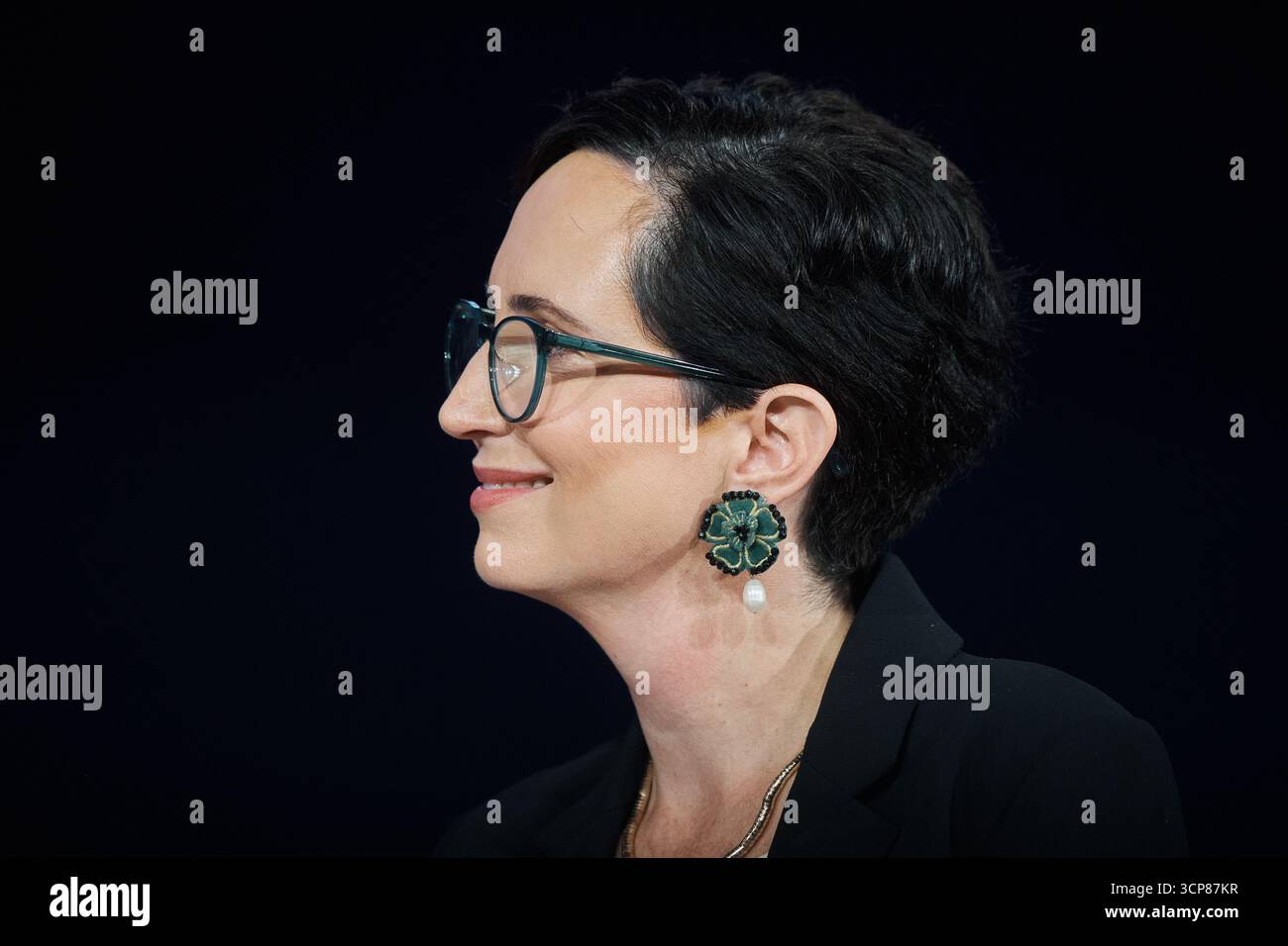 Kate Warren from Devex listens during the Concordia Annual Summit in ...