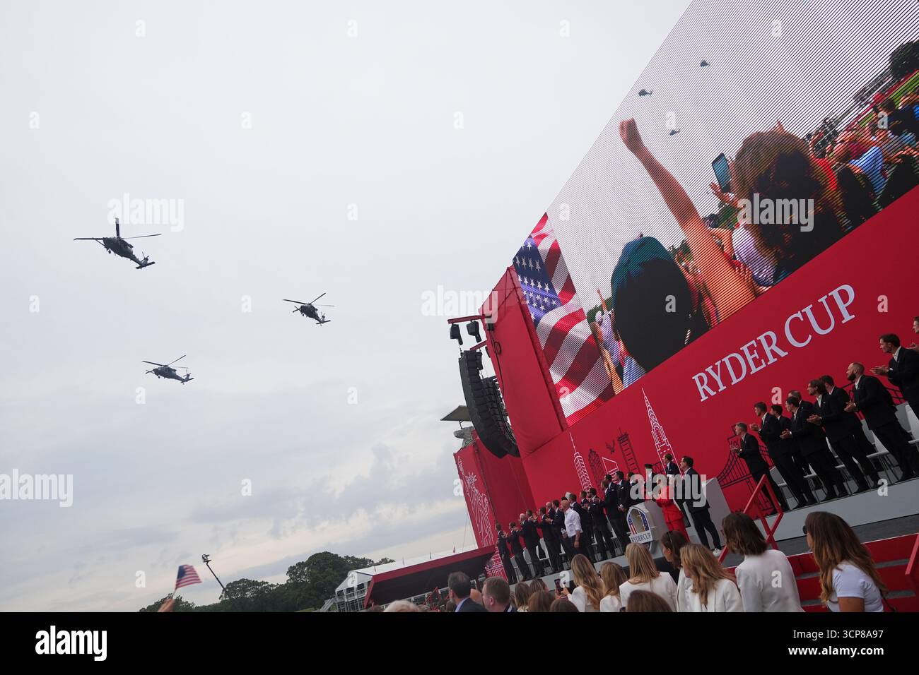 Helicopters fly over during the opening ceremonies for the Ryder Cup ...