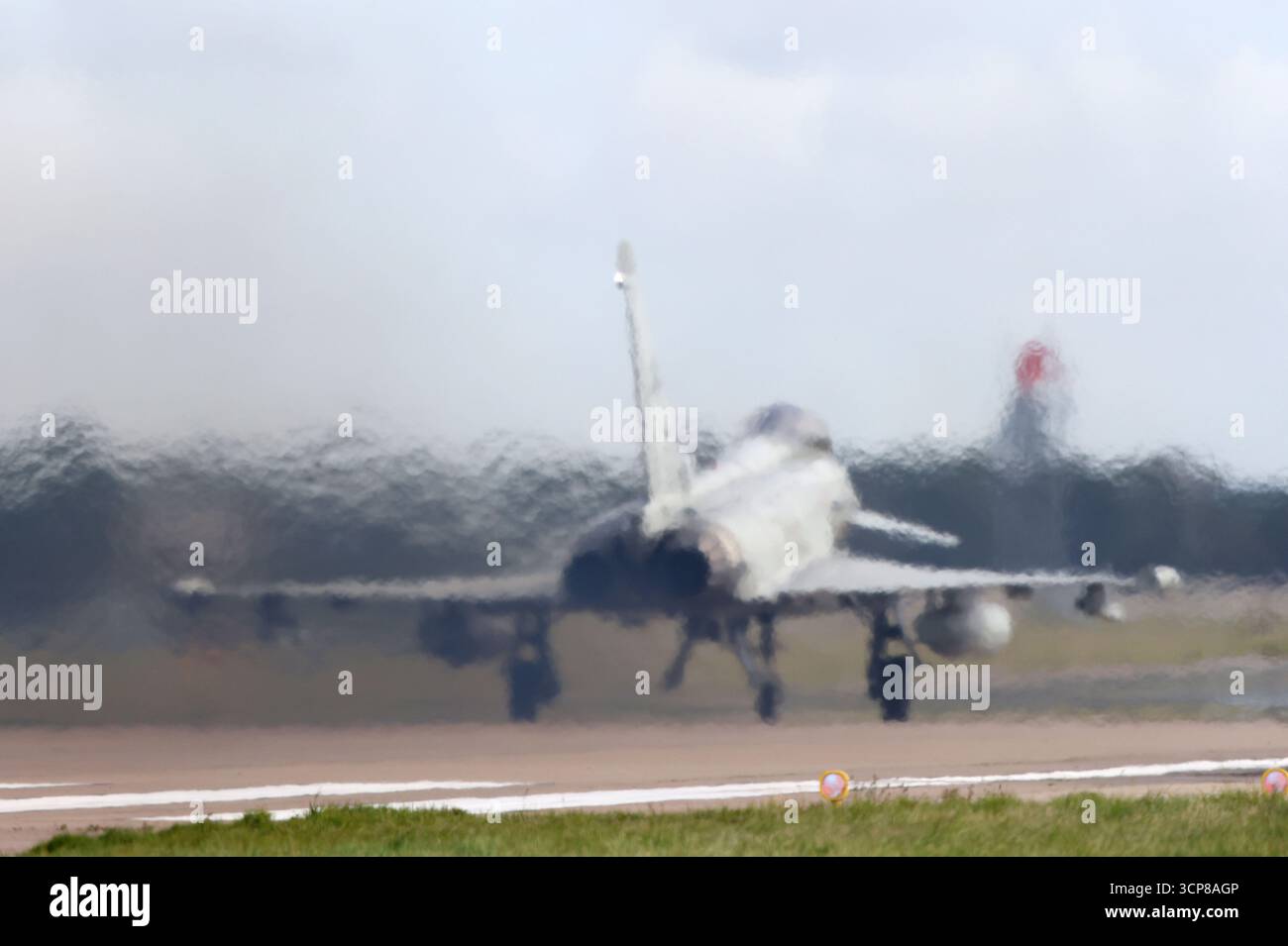 A screen of heat from the jet engines as a Eurofighter Typhoon prepares ...