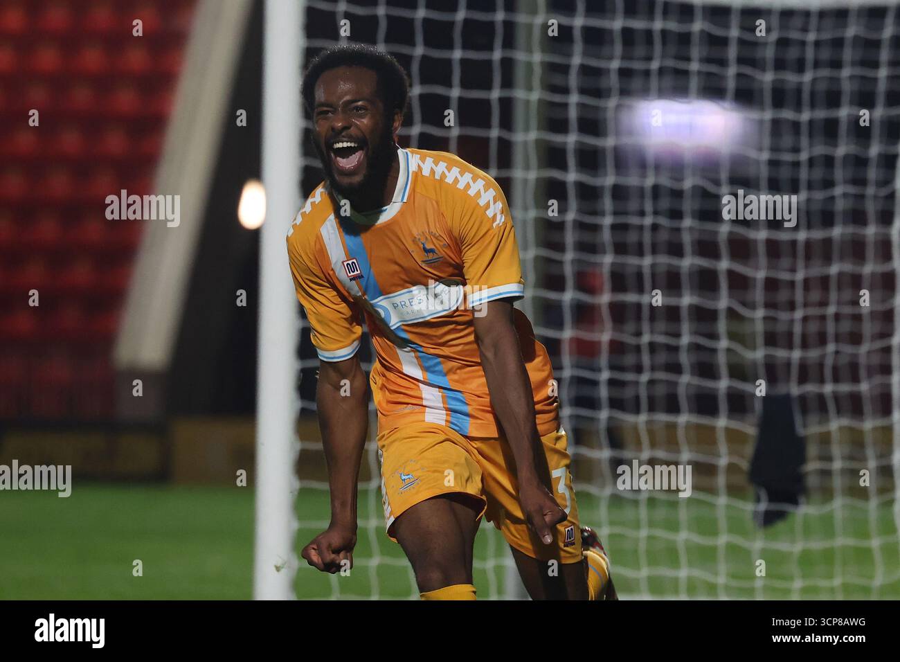 Cameron John of Hartlepool United celebrates after Besart Topalloj ...