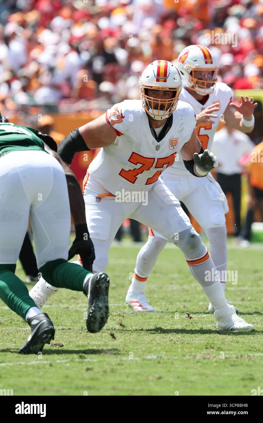 Tampa Bay Buccaneers offensive tackle Charlie Heck (77) sets to block ...