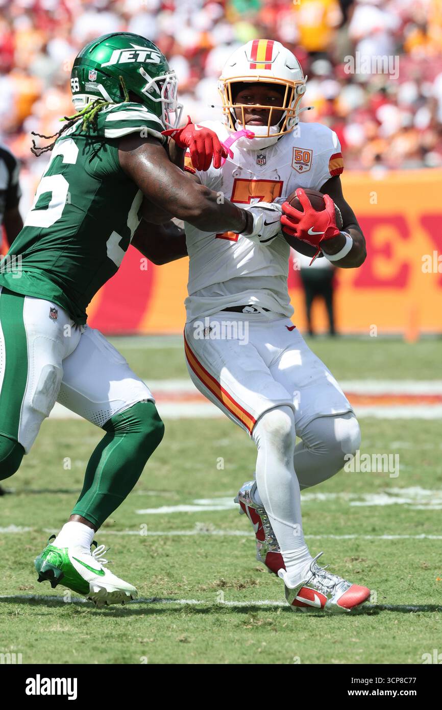 New York Jets linebacker Quincy Williams (56) stops Tampa Bay ...