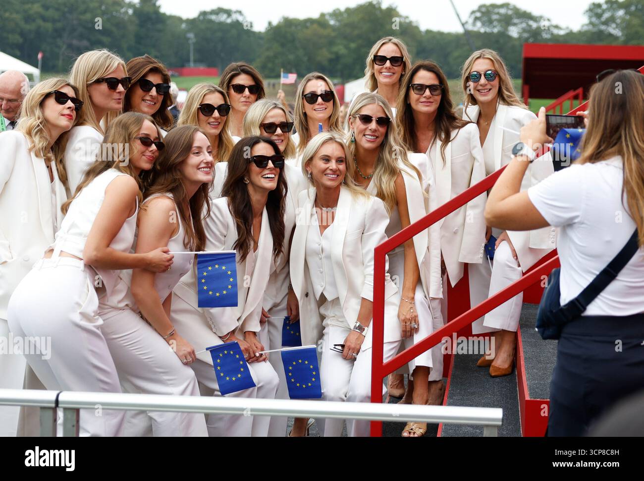 The wives and partners of Team Europe golfers pose for a group photo at ...