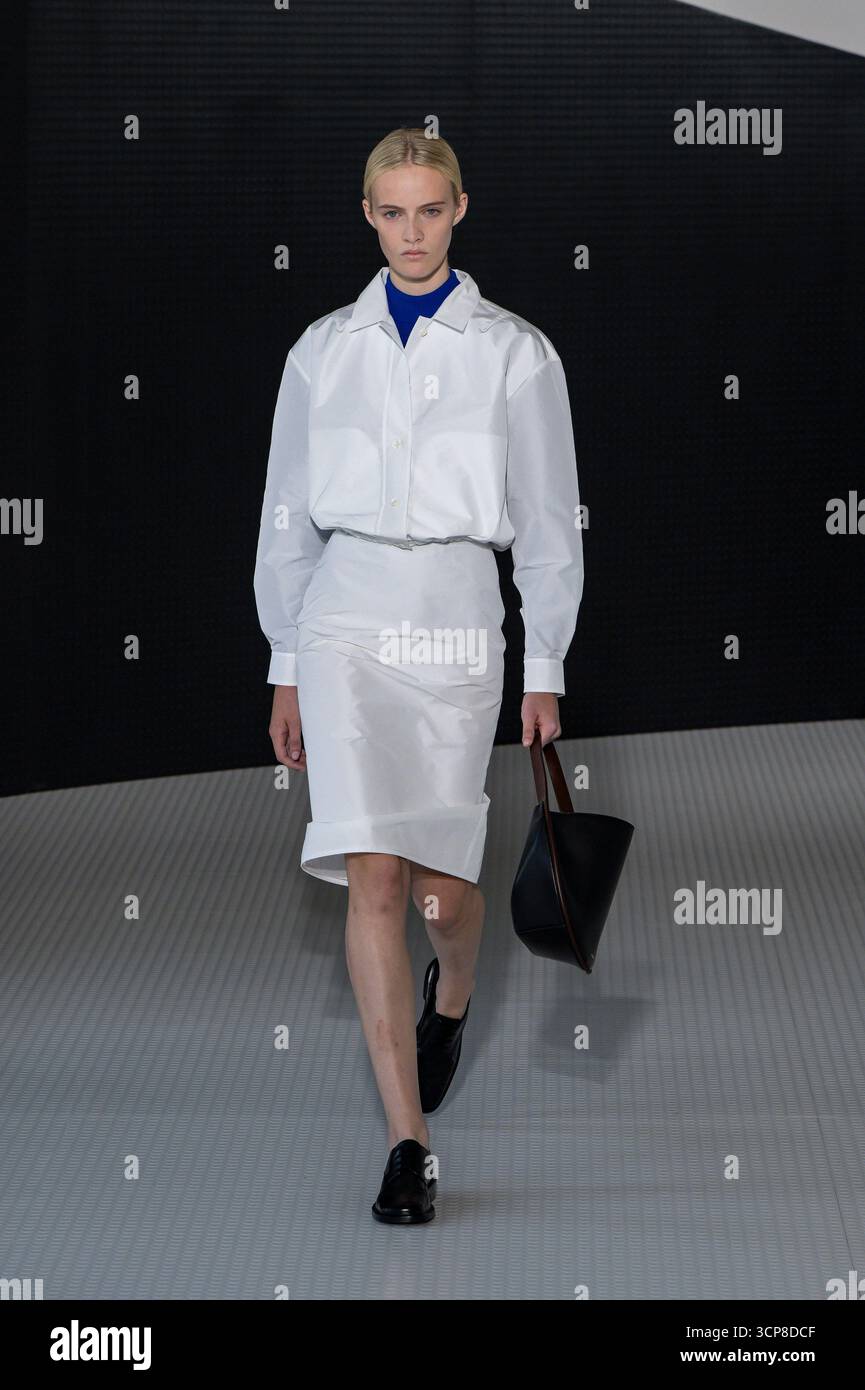 A model is seen on the catwalk at the Jil Sander fashion show during ...