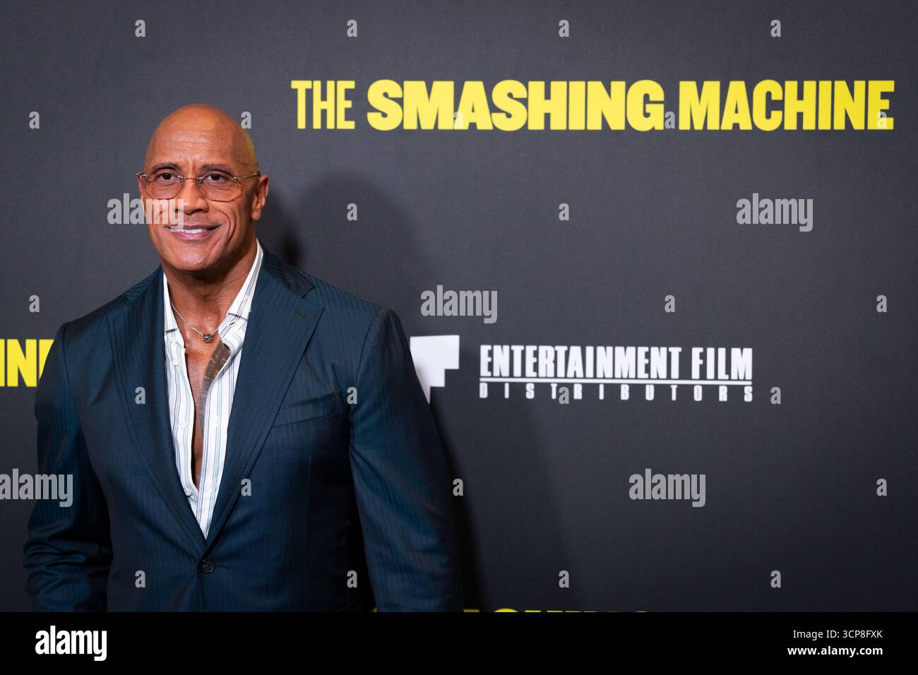 Dwayne Johnson poses for photographers upon arrival at the screening of ...